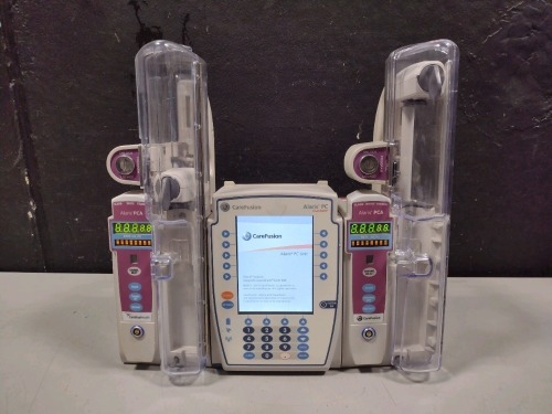 ALARIS PC 8015 SERIES INFUSION PUMP WITH PCA 8120 SERIES MODULES